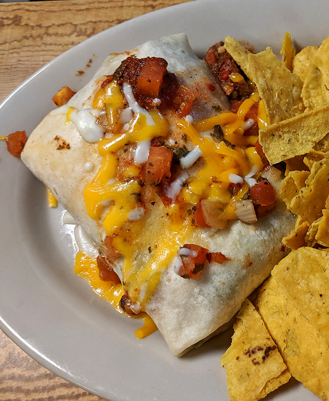 Breakfast burritos should always look this good&mdash;cheese melting like a sunset, with fresh salsa standing by to kick your morning into high gear.