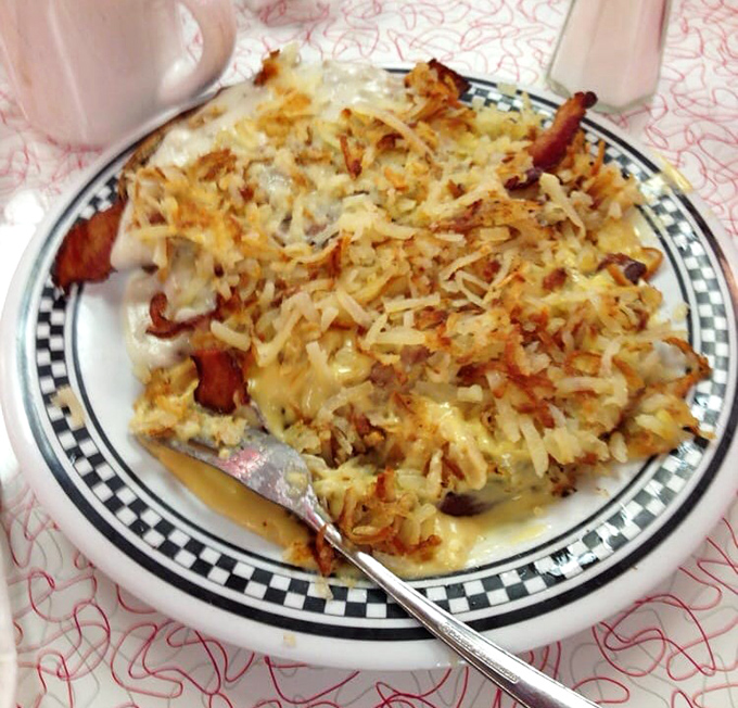 The legendary Breakfast Horseshoe – where hash browns, eggs, meat, and cheese sauce collide in a glorious monument to excess that somehow feels like exactly what you need.