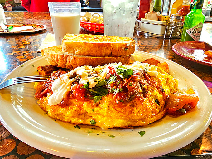 This isn't your standard diner omelet &ndash; it's a flavor fiesta wrapped in eggs, where every bite tells a story of cultural fusion.