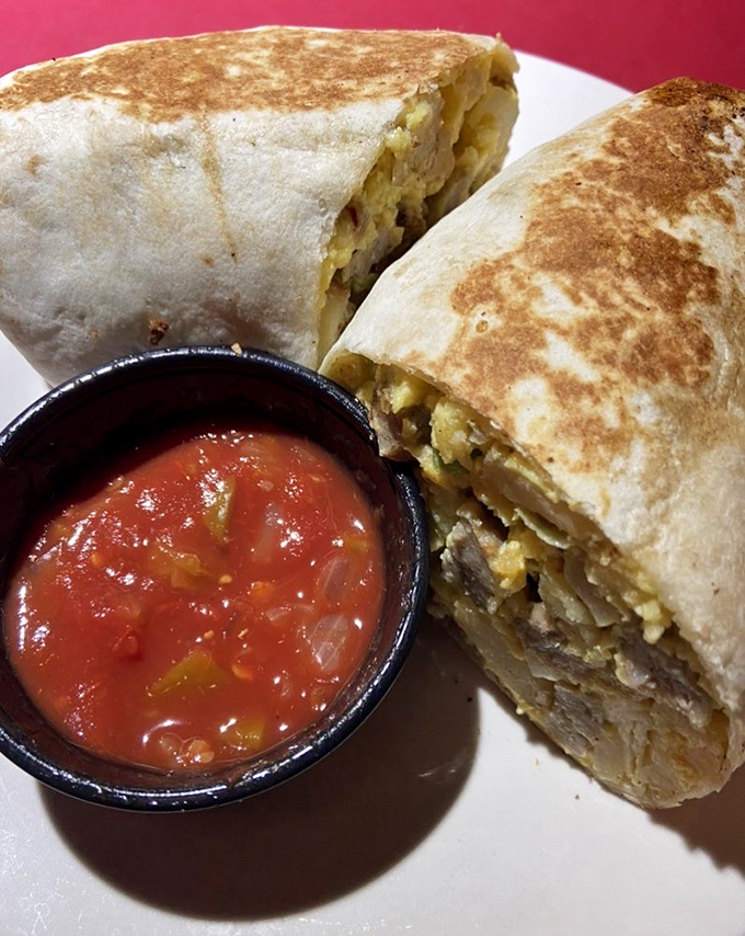 Breakfast burritos: where morning meets Mexico in a hand-held package. This tortilla-wrapped treasure looks substantial enough to fuel a marathon or a Netflix binge.