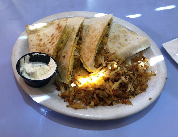 Breakfast wrapped in a tortilla with those famous home fries on the side. Morning fuel that keeps Wilmington running.