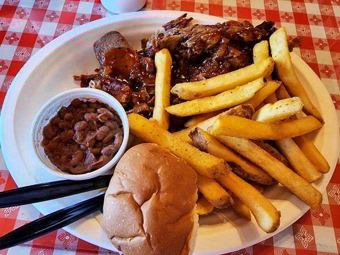 Tender, sauce-slathered brisket alongside golden fries and creamy mac and cheese &ndash; a trifecta of comfort that makes Monday feel like Saturday.