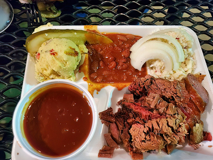 Brisket that's traveled through time and smoke to reach your plate, accompanied by sides that refuse to be overshadowed.