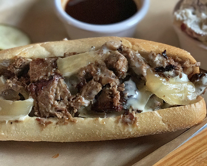 This brisket sandwich isn't just food&mdash;it's architecture. The melted cheese acts as delicious mortar holding together the temple of flavor.