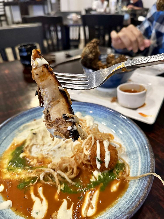 Fork-tender octopus that's convinced even the most tentacle-averse diners to join the eight-armed appreciation society.