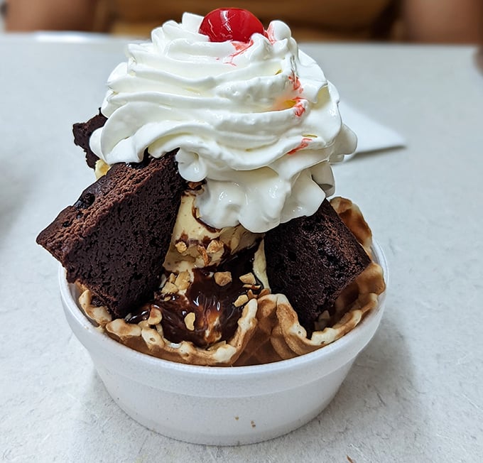 This brownie sundae doesn't just satisfy a sweet tooth—it throws a party for it. Warm brownie chunks create that magical hot-cold contrast.