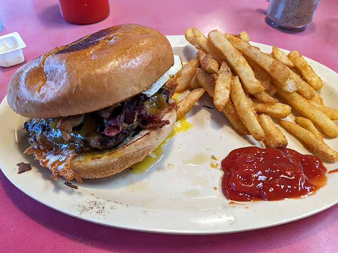 The burger arrives like a delicious dare&mdash;juicy, messy, and demanding your full attention. Diet plans have met their worthy nemesis.