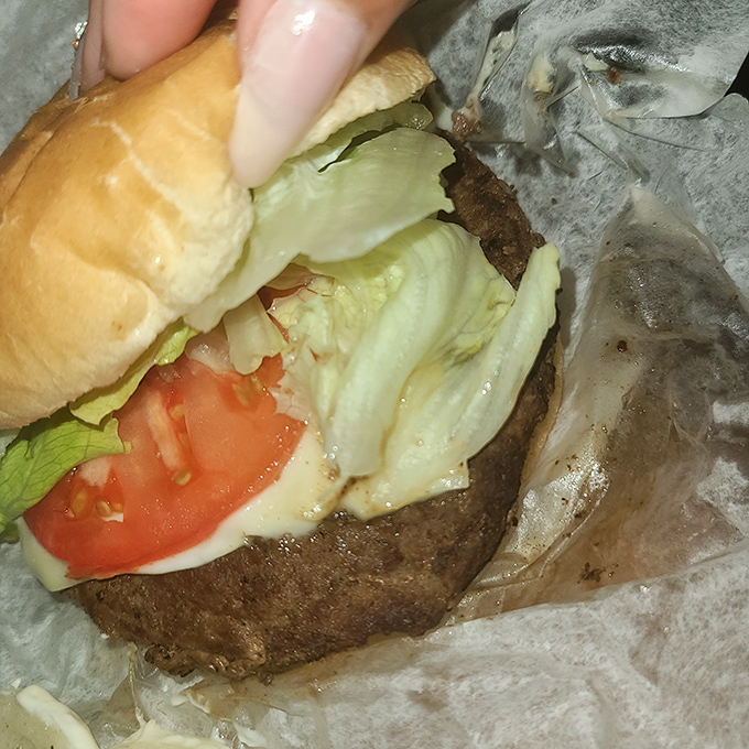 The classic American hamburger&mdash;where lettuce, tomato, and beef unite in a handheld symphony that never goes out of style.