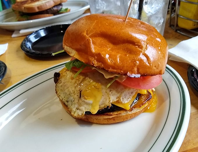 This burger isn't just photogenic &ndash; it's a masterclass in construction with that perfectly melted cheese cascading down the sides.