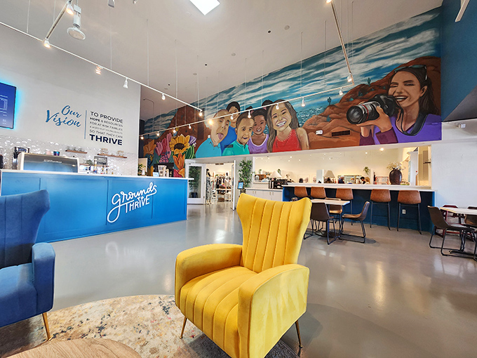 The café area feels like the living room of that friend who always has better taste than you, complete with a mustard chair that deserves its own Instagram.