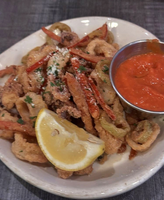 Crispy calamari that doesn't require the workout your jaw gets at lesser establishments. The marinara sauce is the perfect dance partner.