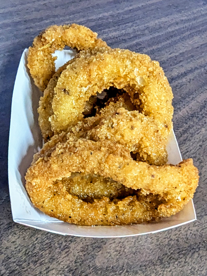 Calamari rings that look like they've earned their PhD in perfect frying. No rubber bands here &ndash; just tender squid in a crispy graduation gown.