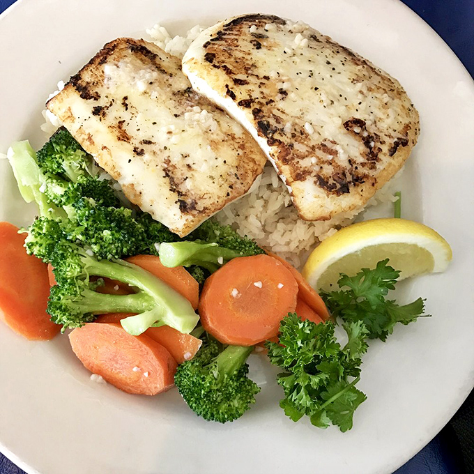 Calamari steaks grilled to perfection &ndash; proof that sometimes the best things come without tentacles attached.