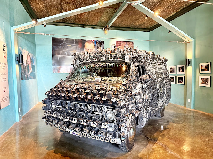 Covered in vintage cameras, this van captures attention better than any paparazzi vehicle ever could dream of. 