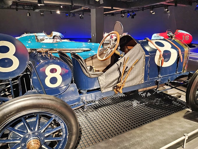 The elegant blue #8 racer harkens back to an era when drivers wore leather helmets and goggles, and courage was measured by how close you sat to an exposed engine.