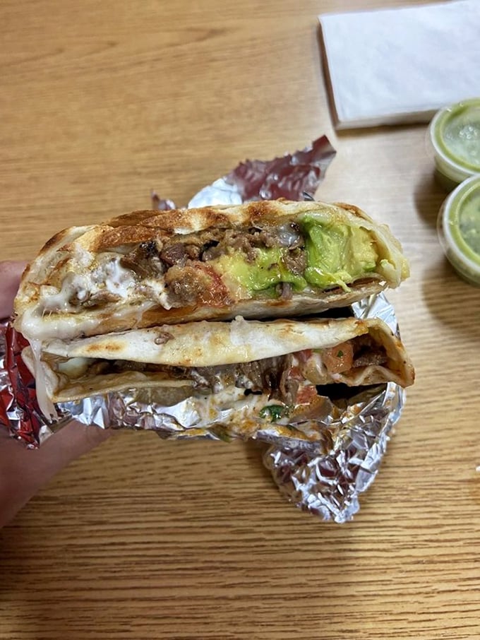 This quesadilla suiza isn't just melted cheese &ndash; it's a spiritual experience with guacamole that makes avocado toast look like amateur hour.