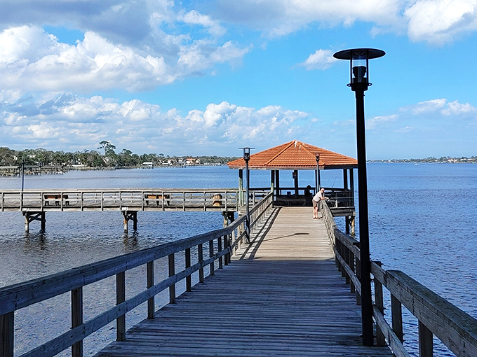 This wooden pier stretches toward possibility, offering contemplative moments and fishing opportunities in equal measure. Sunsets here are free but priceless.