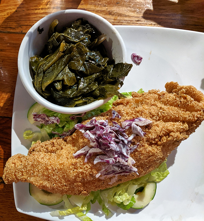 Cornmeal-crusted catfish that's traveled less distance to your plate than you did to the restaurant. The collard greens aren't just a side&mdash;they're a statement.