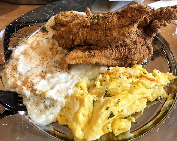 Catfish, eggs, and grits&mdash;the holy trinity of Southern breakfast, executed with the precision of a NASA launch.
