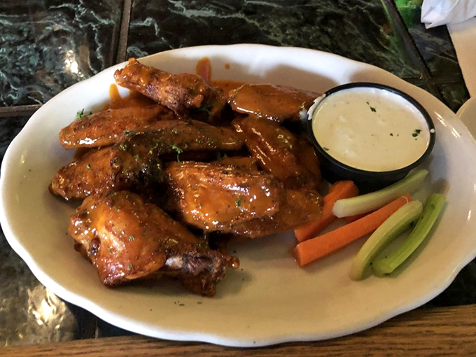 These aren't just wings; they're a sticky, saucy testament to what happens when Irish hospitality meets American game-day traditions.