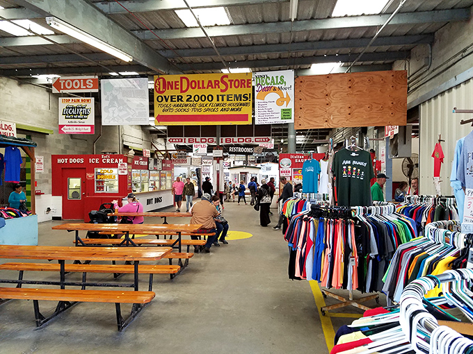 The main thoroughfare buzzes with energy as shoppers navigate between treasures and treats under one massive roof.