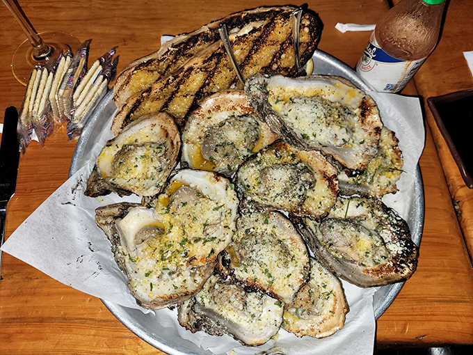 Oysters that make you forget your table manners. Bubbling with cheese and herbs, these charbroiled beauties are what dreams &ndash; and return trips &ndash; are made of.