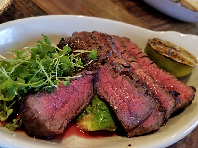 The Wagyu steak that launched a thousand real estate searches. Perfectly charred exterior, ruby-red interior, and a flavor that makes vegetarians question their life choices.