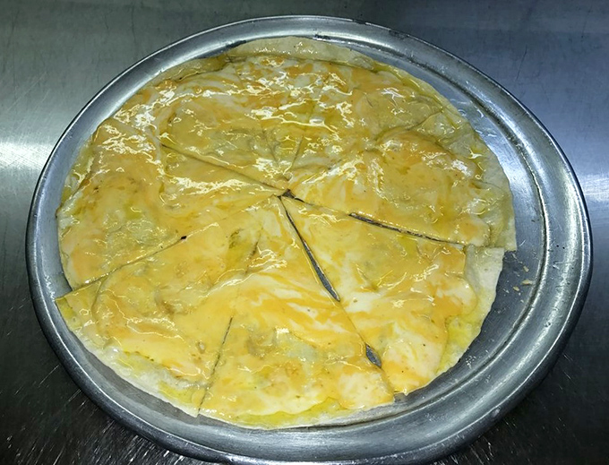 The cheese crisp—Arizona's answer to pizza—arrives hot, bubbling, and ready for its close-up. Simple perfection that needs no filter.