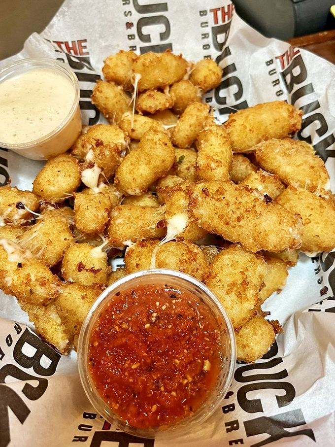 Cheese curds that squeak with Wisconsin pride, fried to golden perfection. The Midwest's answer to popcorn.