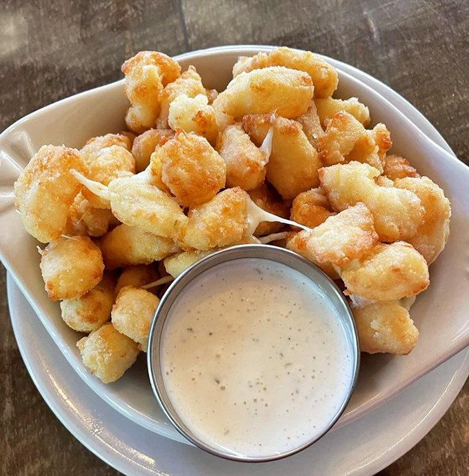 Wisconsin's unofficial state food&mdash;cheese curds&mdash;fried to golden perfection and served with a dipping sauce worth writing home about.