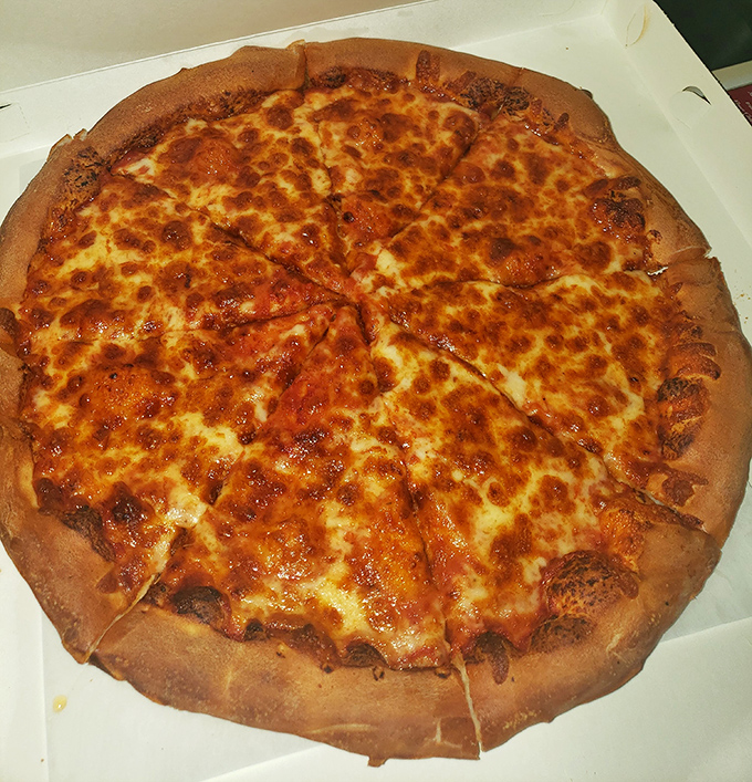 Pizza perfection doesn't need to be complicated. This cheese pie has the ideal sauce-to-cheese ratio that chain restaurants spend millions trying to replicate.