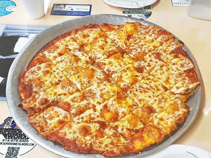 The party-cut squares of this cheese pizza aren't just a Midwestern tradition&mdash;they're an ingenious solution to the age-old debate of corner pieces versus center slices.