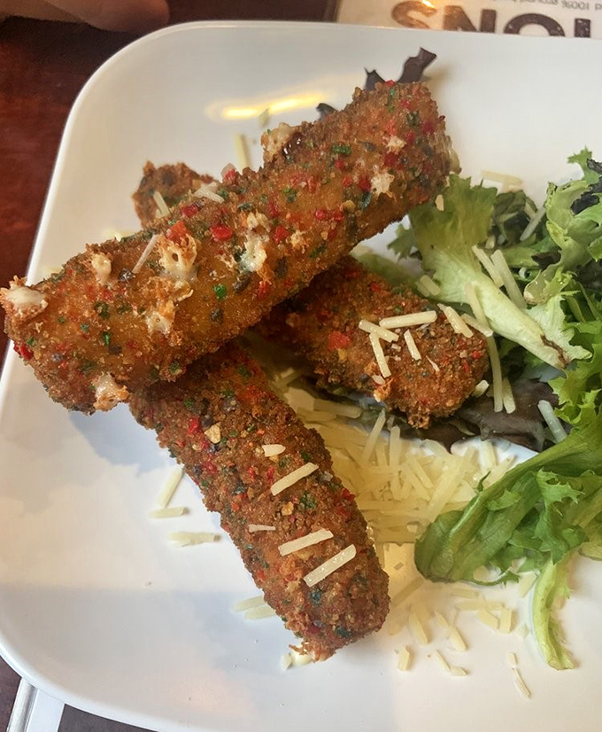 These aren't your average mozzarella sticks&mdash;they're crispy, golden-brown vessels of melty cheese joy that demand to be pulled apart dramatically.