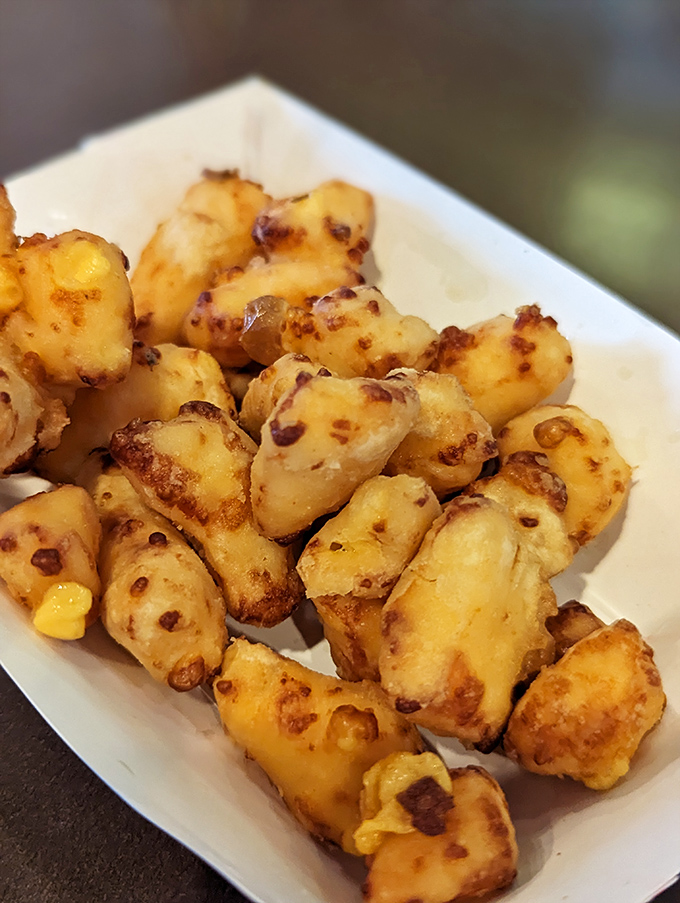 Wisconsin's unofficial state treasure&mdash;cheese curds that look like little nuggets of gold. Crispy outside, melty inside, happiness throughout.