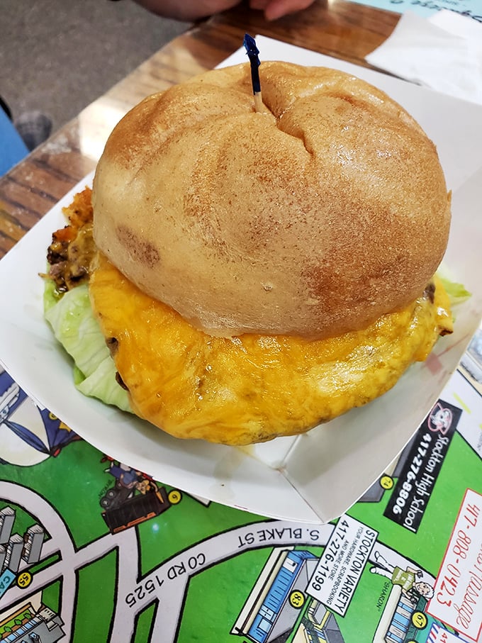 Burger perfection doesn't need fancy descriptions. A perfectly toasted bun, melted cheese cascading over fresh beef—this is honest-to-goodness happiness on a plate.