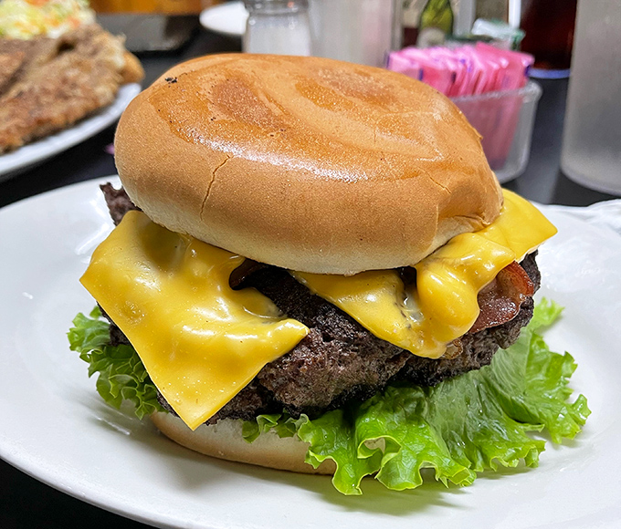 This isn't just a cheeseburger&mdash;it's a monument to beef architecture, with cheese melting like a Texas sunset over that perfectly seasoned patty.