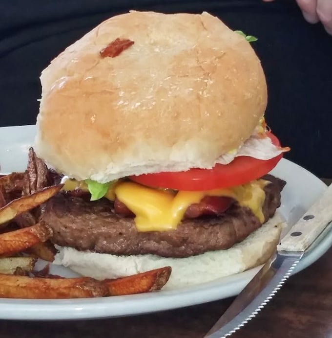 This isn't just a burger&mdash;it's architectural perfection. The melty cheese cascading down the patty creates a moment worthy of slow-motion replay.
