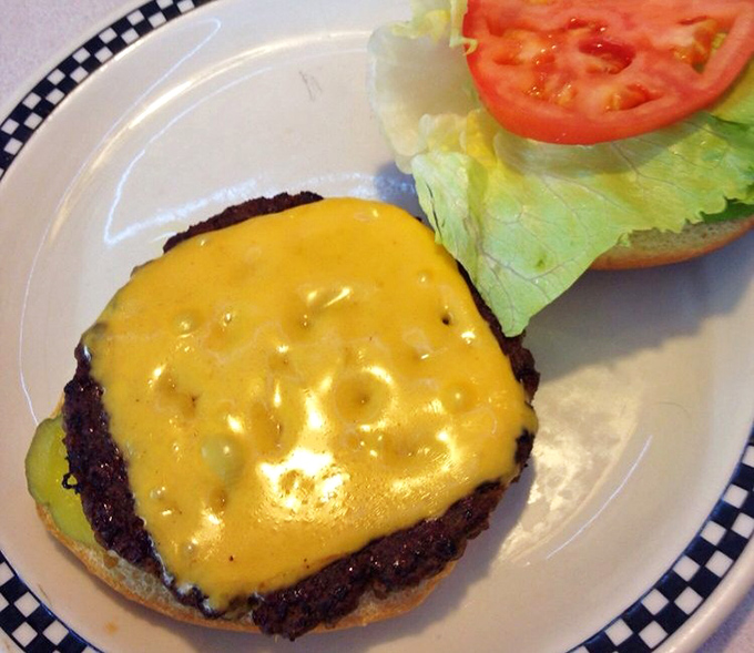 This isn't some artisanal farm-to-table burger deconstructed by a chef with tweezers—it's the real deal, where cheese actually melts and buns aren't an afterthought.