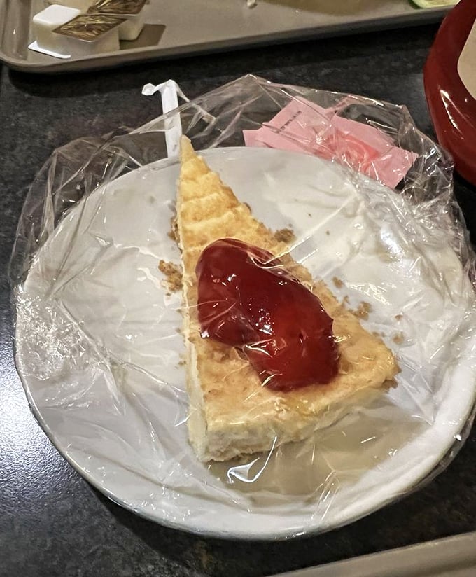 Sometimes the simplest pleasures hit hardest: classic cheesecake that whispers "you've earned this moment of bliss."