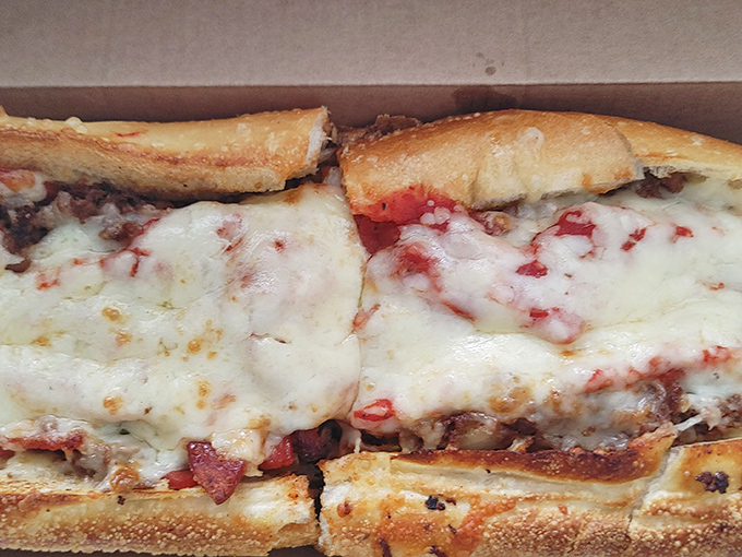 Cheesesteak nirvana awaits between these rolls. The melted cheese blankets the meat like a comforting hug for your taste buds.
