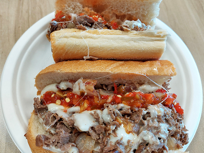 The cheesesteak – where thinly sliced beef meets molten cheese in a romance hotter than any Hollywood movie. Pure Philadelphia poetry.