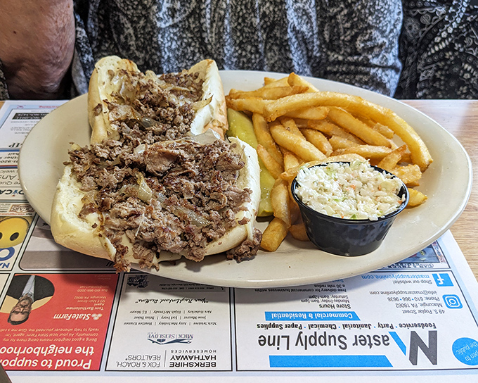 Not all heroes wear capes &ndash; some come on a long roll with perfectly seasoned beef, melted cheese, and a side of crispy fries and coleslaw.