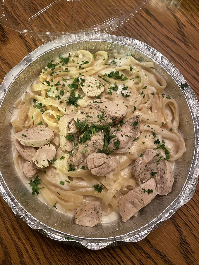 Creamy fettuccine Alfredo with tender chicken&mdash;the kind of comfort food that makes you want to hug the chef afterward.
