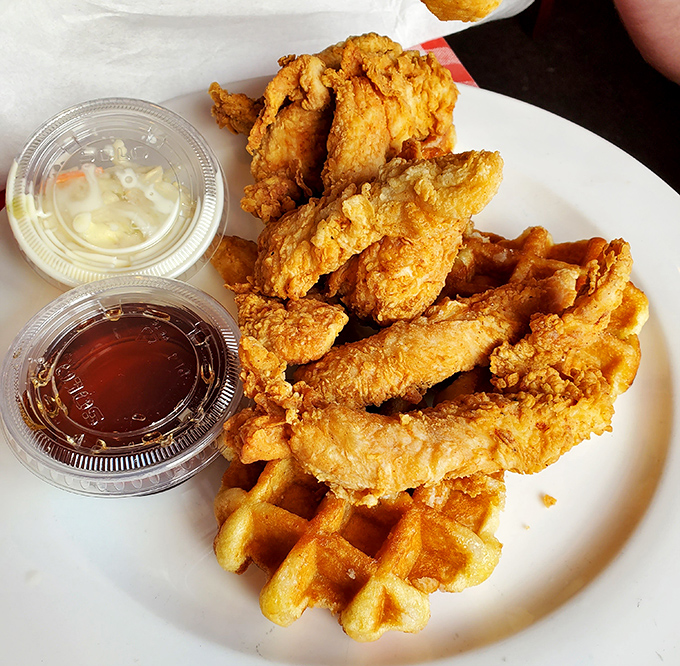 Chicken and waffles: the culinary equivalent of finding out your favorite band and your best friend get along perfectly. Sweet, savory, and absolutely worth the drive.