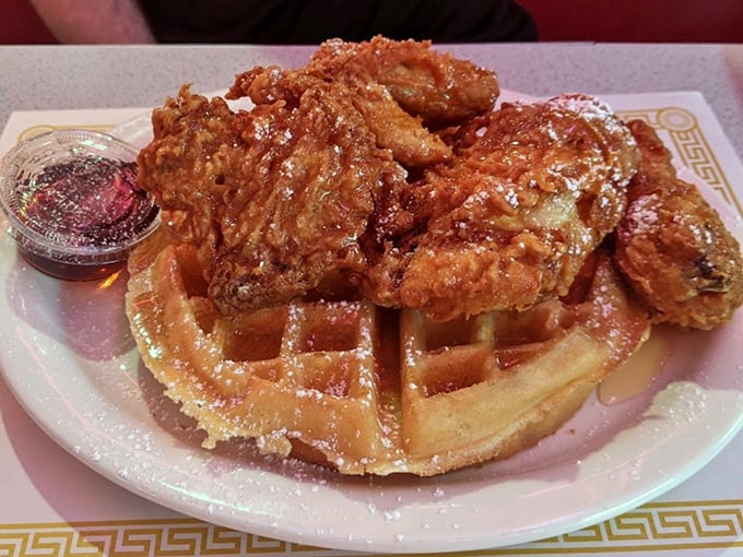 The ultimate comfort food marriage: golden waffles cradling perfectly fried chicken. Like breakfast and dinner decided to elope and live happily ever after.