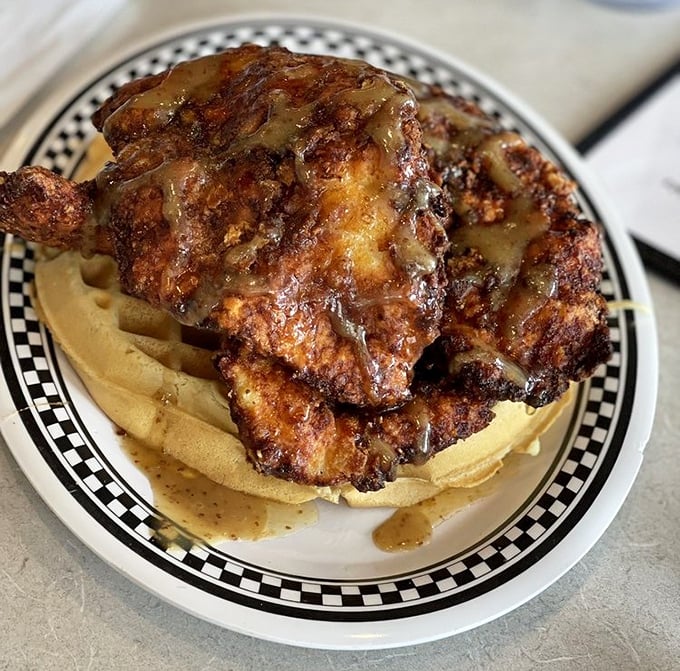 Chicken and waffles living in perfect harmony, like Simon and Garfunkel if they were breakfast foods.