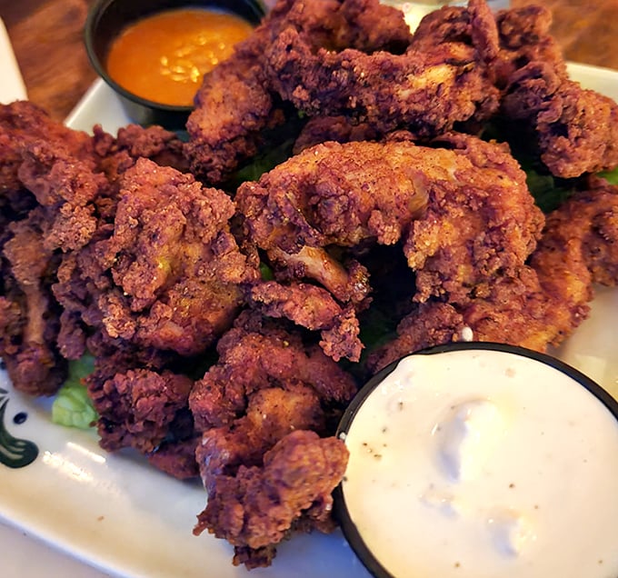 These aren't just chicken tenders; they're crispy little masterpieces that would make Colonel Sanders weep with jealousy. The dipping sauce seals the deal.