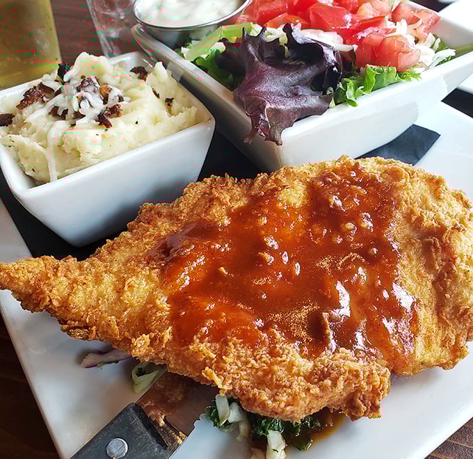 Crispy chicken perfection with sides that don't know the meaning of "afterthought." This plate means business.