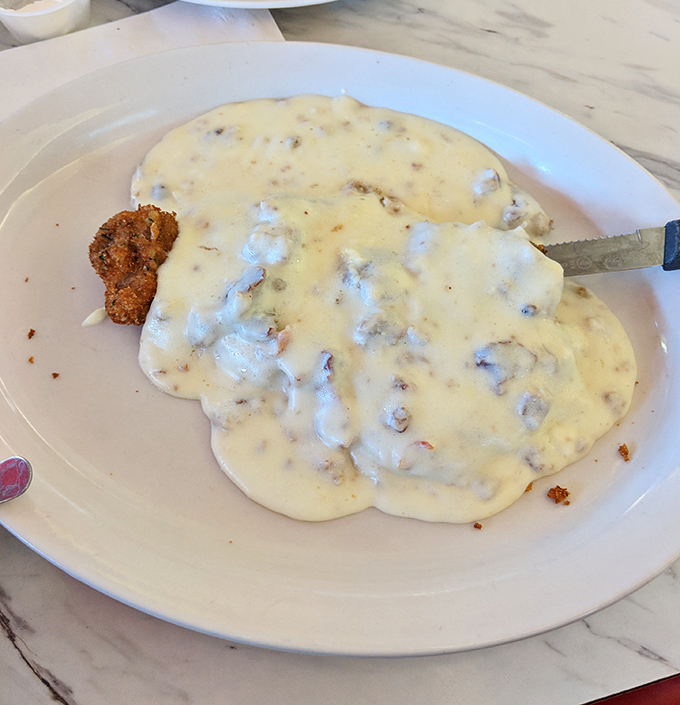 Creamy country gravy blankets this hearty dish like a delicious winter storm. One bite and you'll understand why comfort food never goes out of style. 