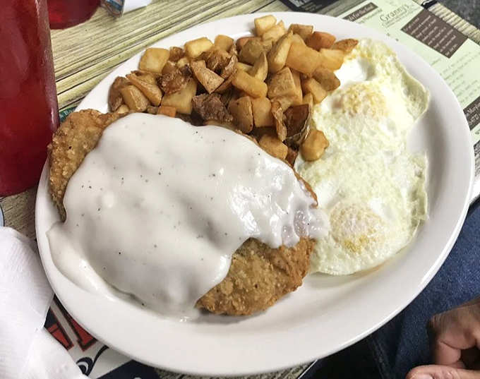 Country-fried steak smothered in gravy with home fries and eggs&mdash;the breakfast equivalent of a warm hug from someone who really means it.